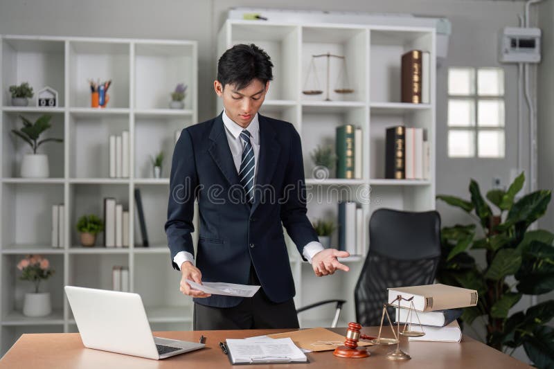 Young Businessman Looking Disappointed at Work, Sitting at Desk with ...
