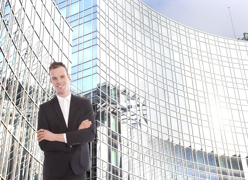Young Businessman in Front of Office Building Stock Image - Image of ...