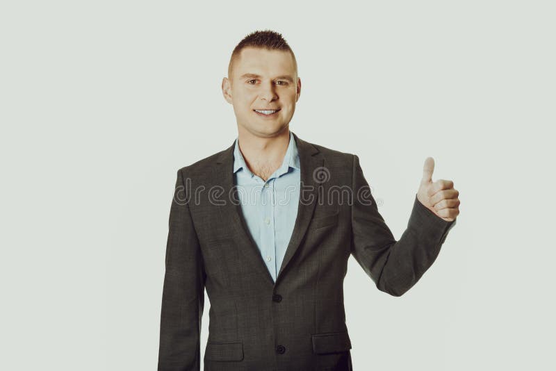 Young Businessman Gesturing Ok Sign Stock Photo - Image of hand ... Young Businessman Gesturing Ok Sign Stock Photo - Image of hand ...