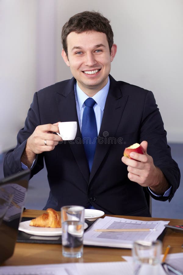 Young Businessman Having a Break during Meeting Stock Image - Image of ...