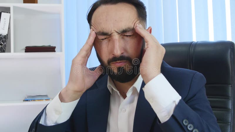 Businessman Having Head Pain during Work in Office Stock Image - Image ...