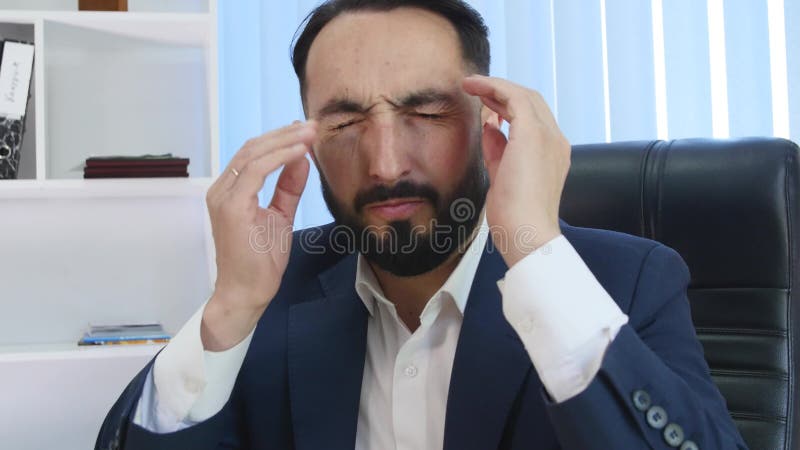 Young Businessman Having Head Pain during Work in Office Stock Image ...