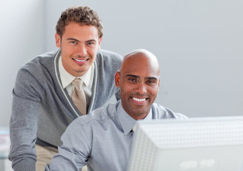Young Businessman Helping His Colleague Stock Image - Image of male ...