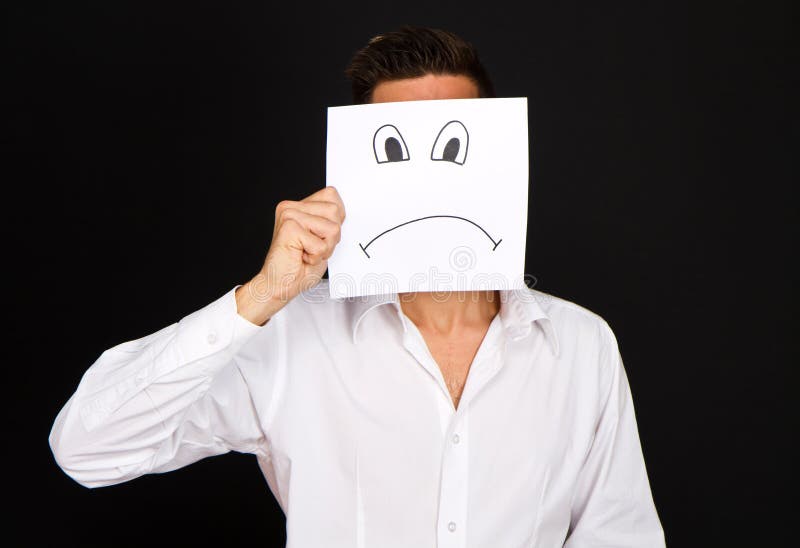A Young Businessman Holding Card with a Angry Face Stock Image - Image ...