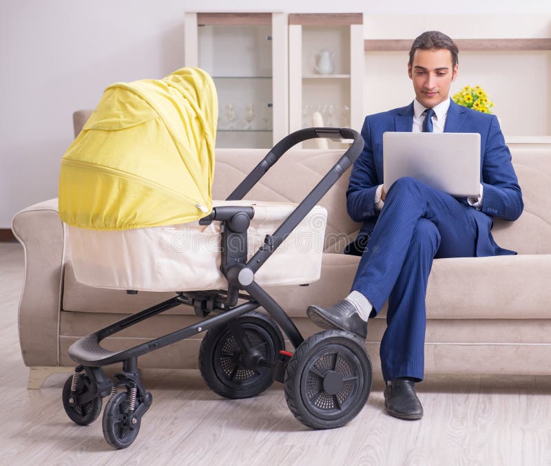 Young Businessman Looking after Baby Stock Image - Image of home ...