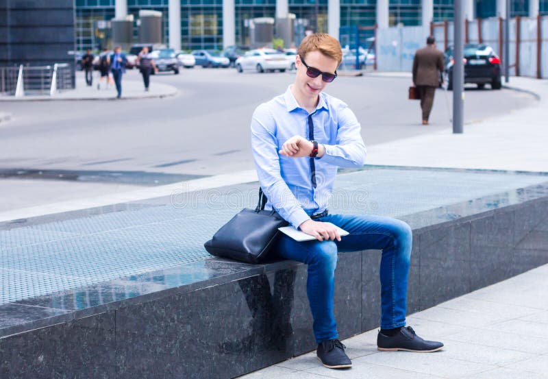 Young Businessman Looking at the Clock with Smile and Waiting for the ...