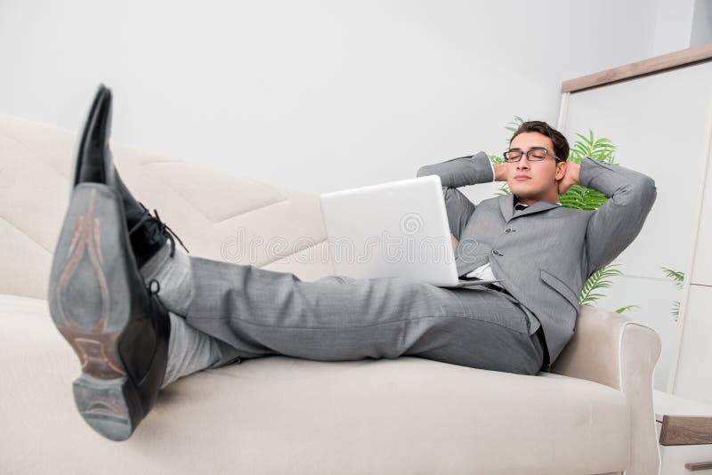 The Young Businessman Lying on the Sofa Stock Photo - Image of cheerful ...