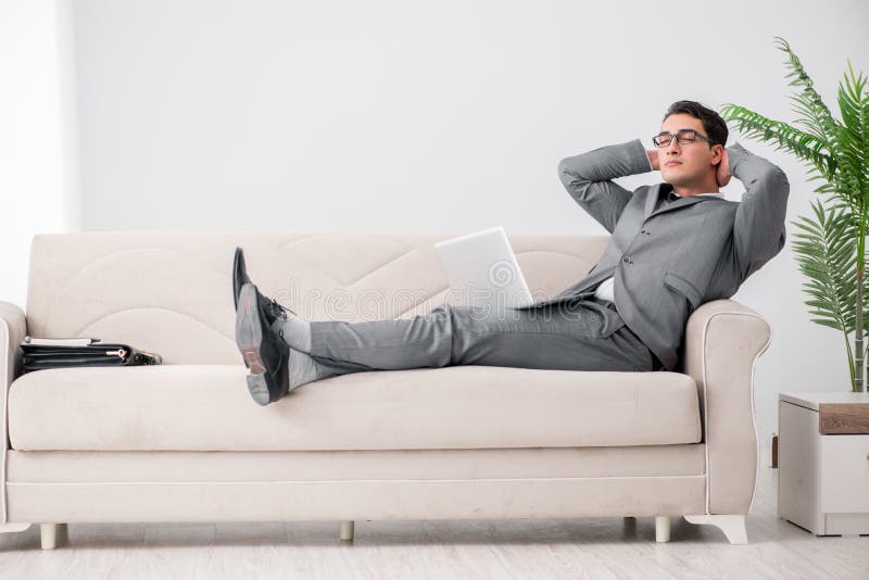 The Young Businessman Lying on the Sofa Stock Image - Image of rest ...