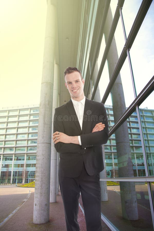 Young Businessman Outside an Office Building Stock Image - Image of ...