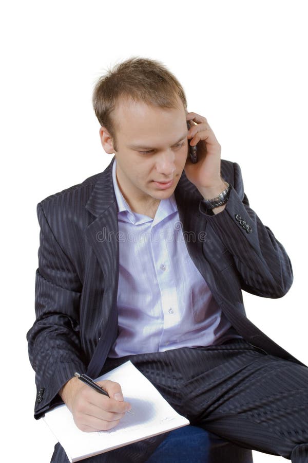 Young Businessman on the Phone Taking Notes Stock Image - Image of ...