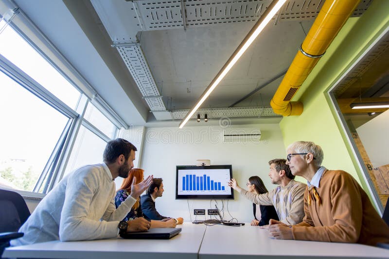 Young Businessman Presenting Project Strategy Showing Ideas on ...