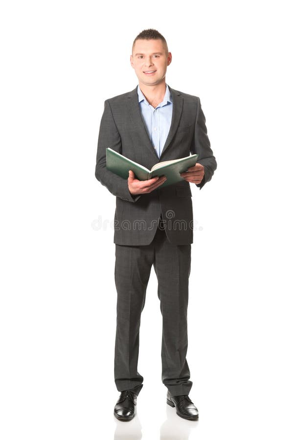 Young Businessman Reading His Note Book Stock Photo - Image of concept ...