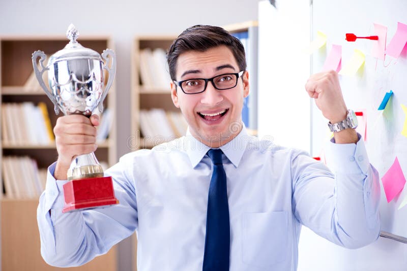 The Young Businessman Receiving Prize Cup in Office Stock Image - Image ...