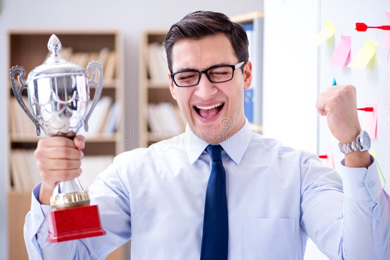 The Young Businessman Receiving Prize Cup in Office Stock Photo - Image ...