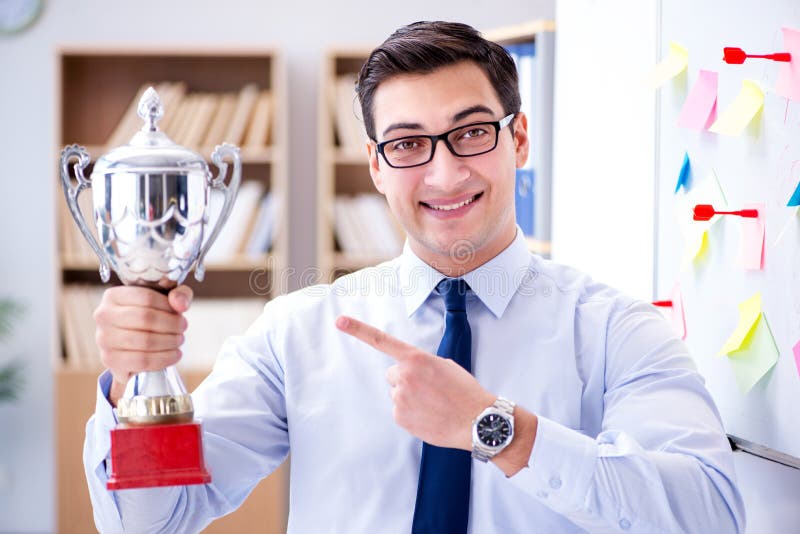 The Young Businessman Receiving Prize Cup in Office Stock Photo - Image ...