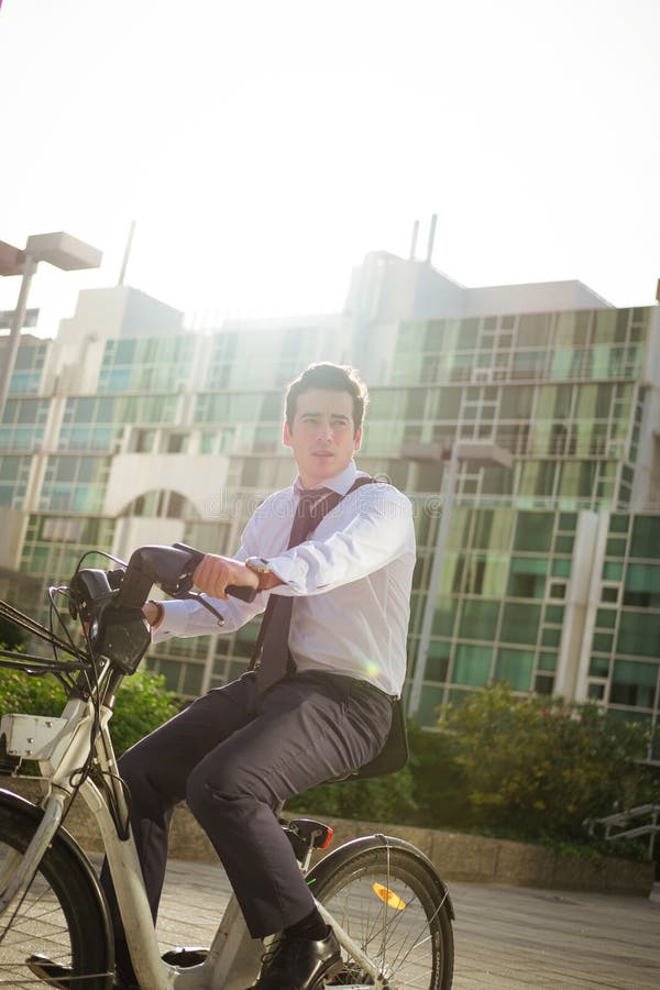 Young Businessman Riding To Work in the City Stock Photo - Image of ...
