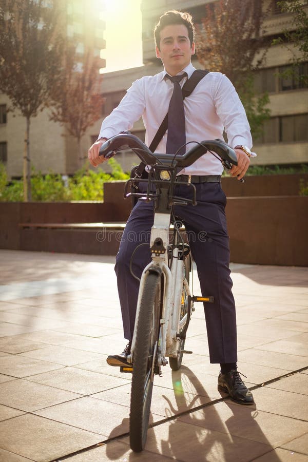 Young Businessman Riding To Work in the City Stock Photo - Image of ...