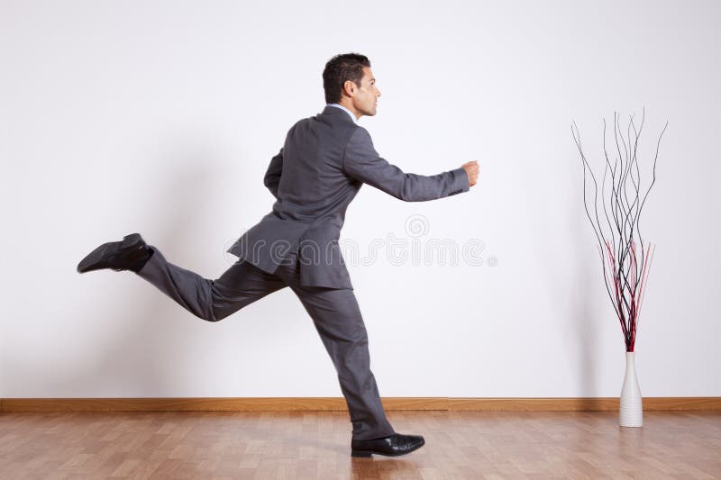 Young Businessman Running Inside the Office Stock Image - Image of ...