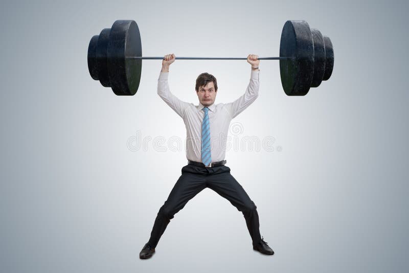 Young Businessman in Shirt is Lifting Heavy Weights. Stock Image ...