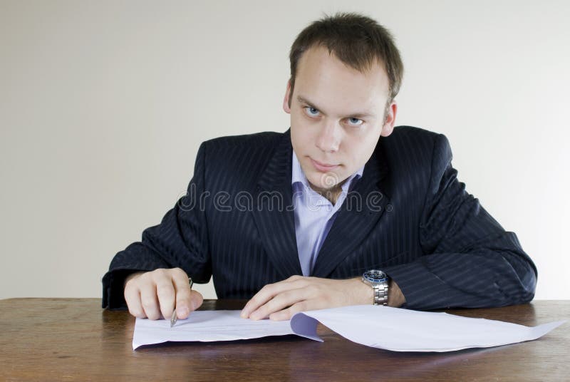 Man Signing Papers and Contracts on the Table Stock Photo - Image of ...