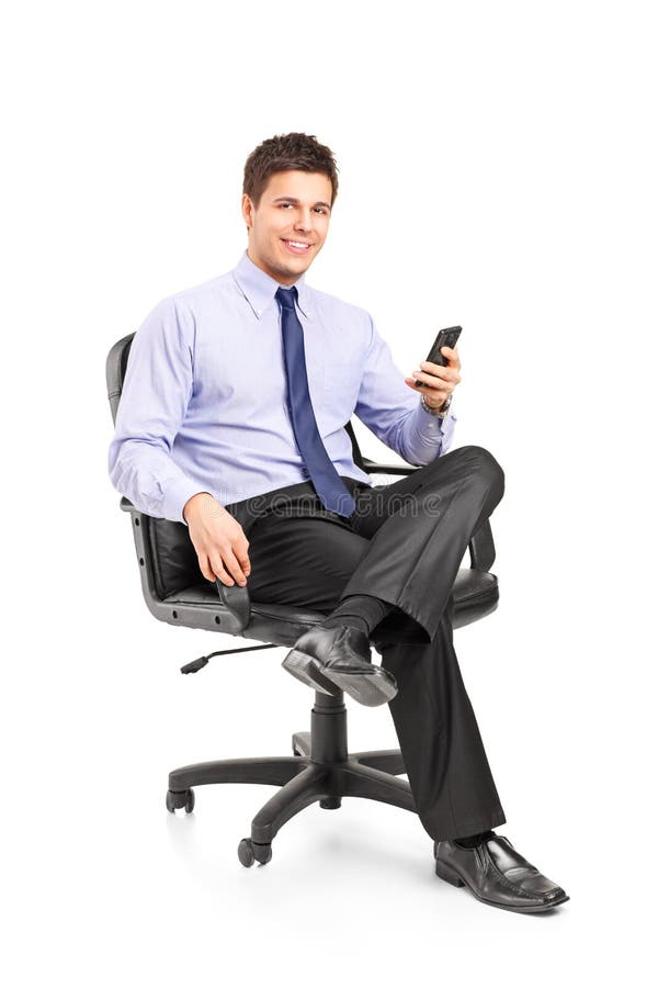 Young Businessman Sitting On A Chair Stock Image - Image: 23470353