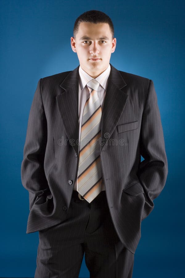 Young businessman standing stock image. Image of standing - 1383323 Young businessman standing stock image. Image of standing - 1383323
