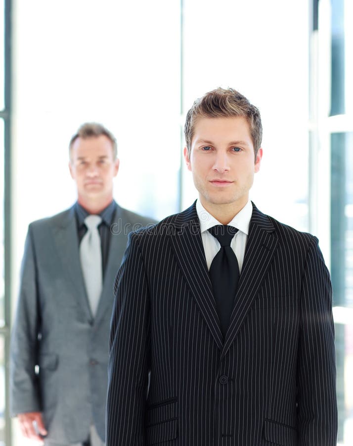 Young Businessman Standing in Front of the Camera Stock Image - Image ...