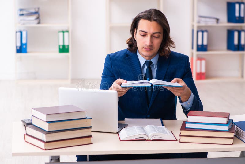Young Businessman Student Studying at Workplace Stock Image - Image of ...