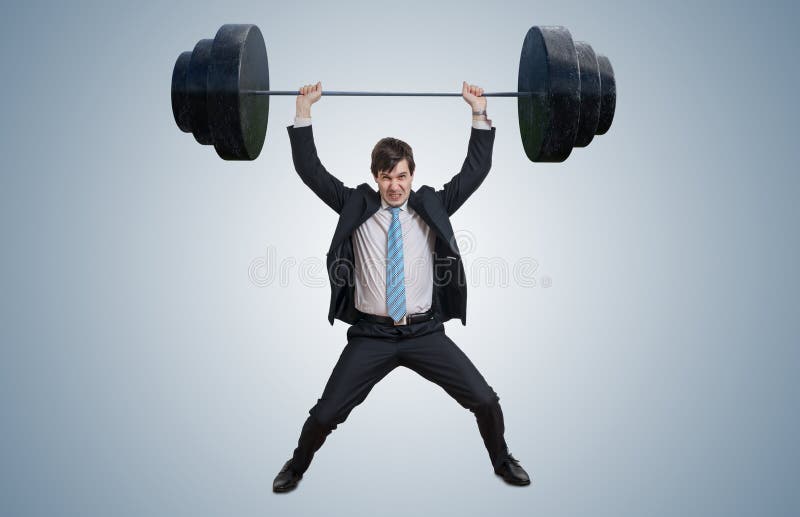 Young Businessman in Suit is Lifting Heavy Weights. Stock Image - Image ...