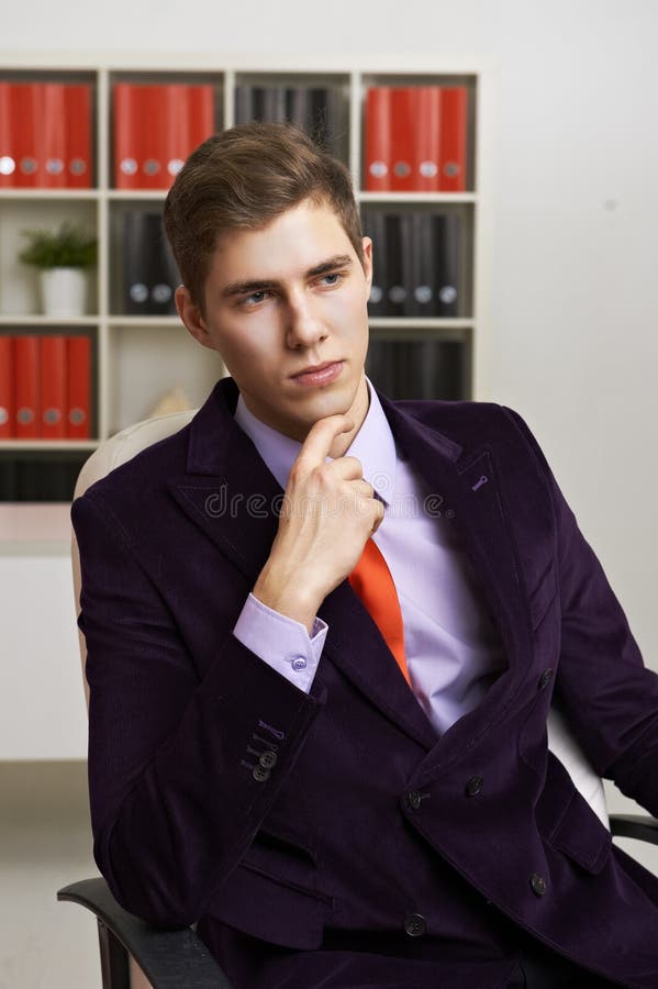Young businessman thinking stock photo. Image of adult - 50821328
