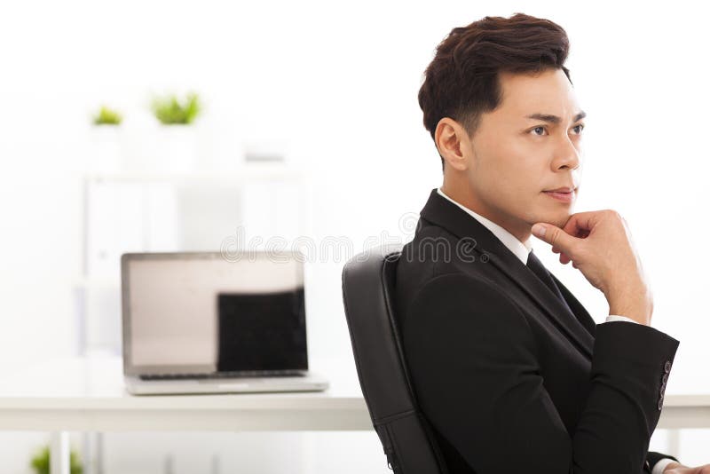 Young Businessman Thinking in the Office Stock Photo - Image of manager ...