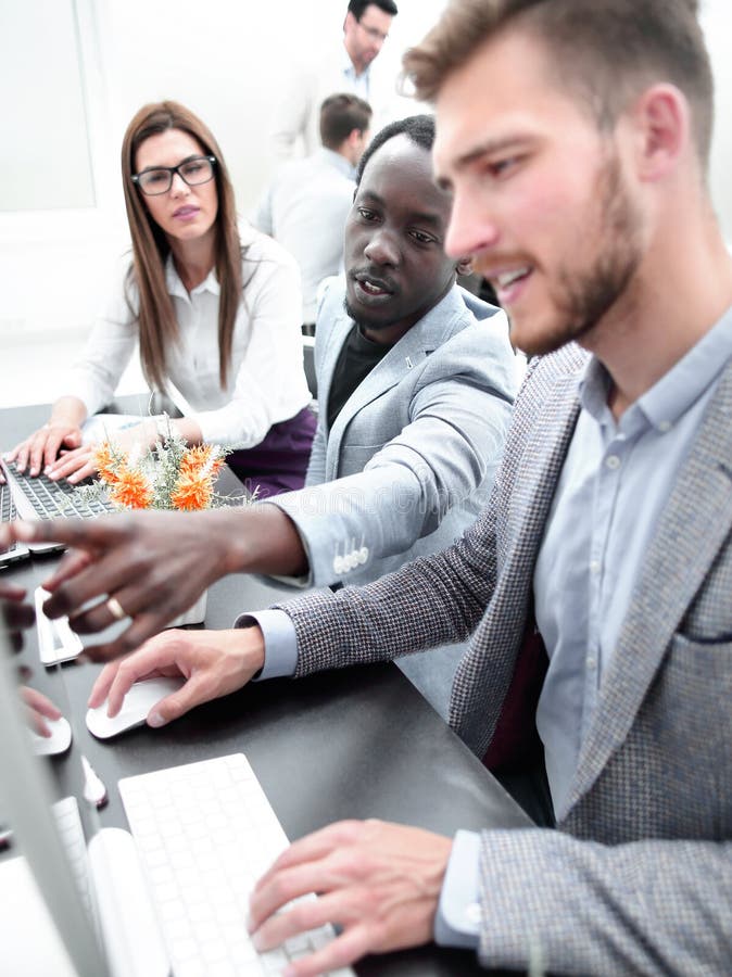 Young Businessman Using a Computer in the Workplace Stock Photo - Image ...