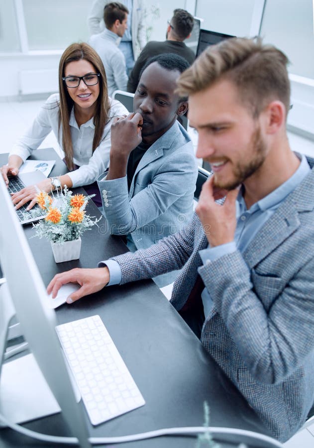 Young Businessman Using a Computer in the Workplace Stock Photo - Image ...