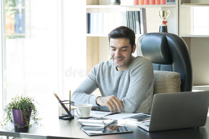 Young Businessman Using Laptop Computer Notebook for Work. Relaxed ...