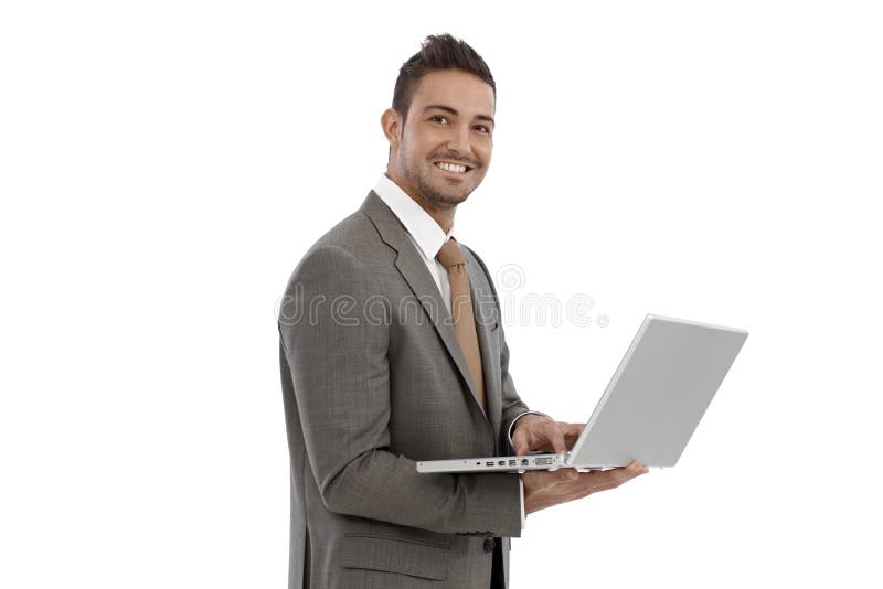 Young Businessman Using Laptop Smiling Stock Photo - Image of contact ...