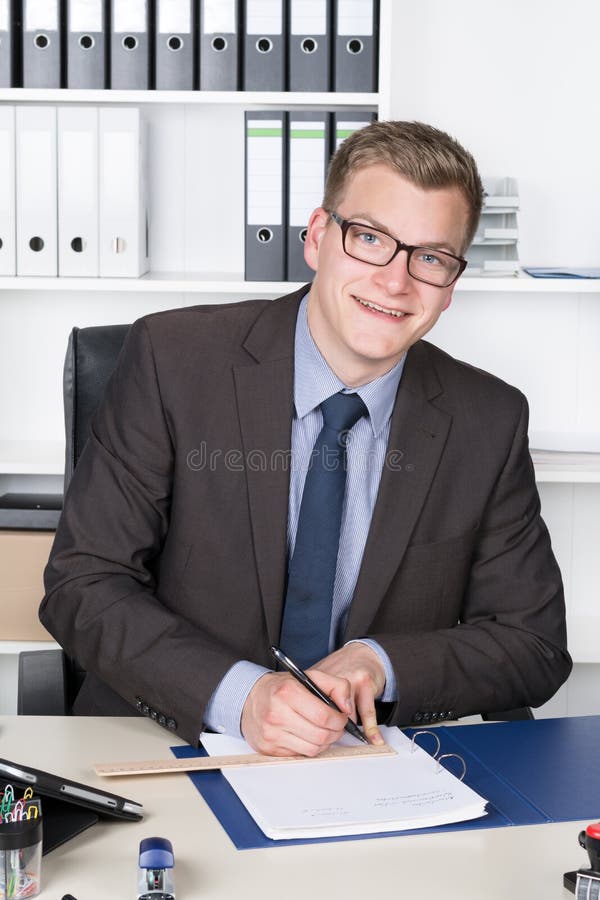 Young Businessman is Using a Ruler Stock Image - Image of gray, person ...