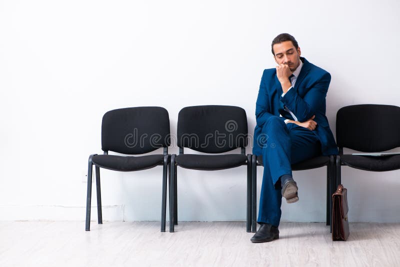 Young Businessman Waiting for an Interview at Hall Stock Photo - Image ...