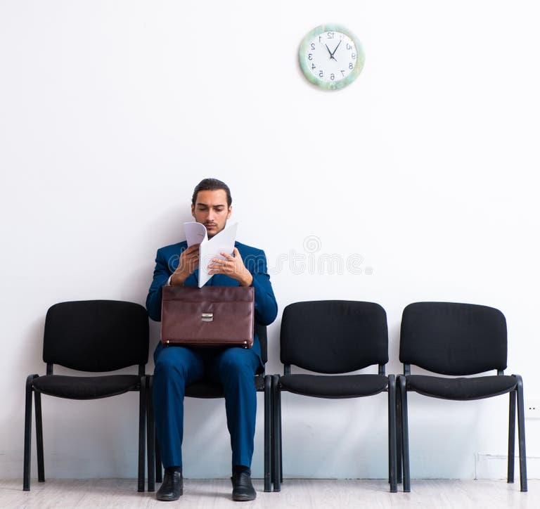 Young Businessman Waiting for an Interview at Hall Stock Photo - Image ...