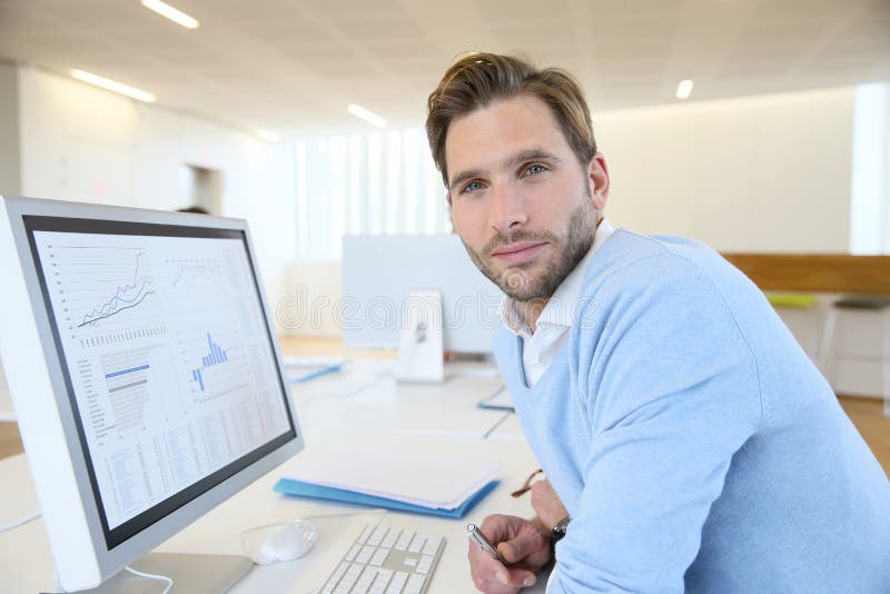 Young Businessman Working on Computer at Office Stock Image - Image of ...