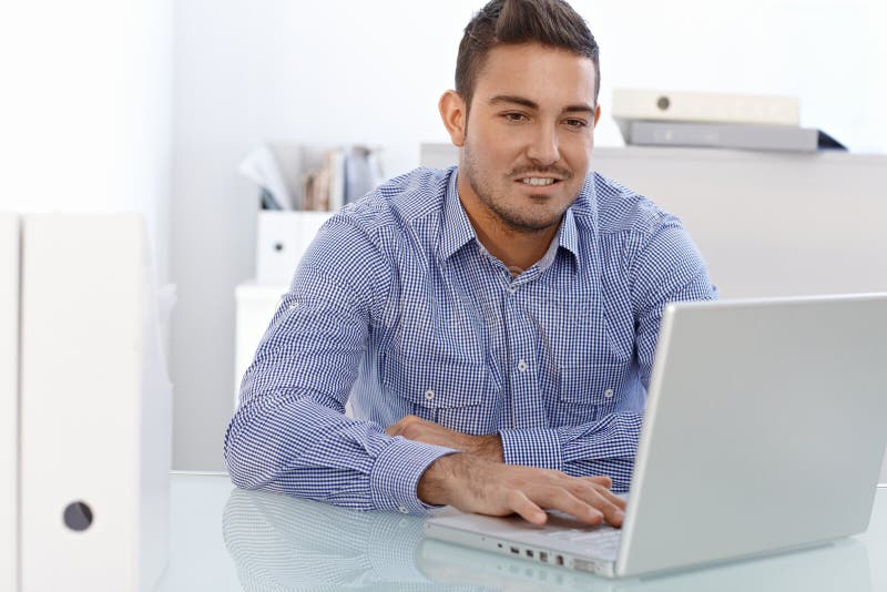 Young Businessman Working on Laptop Stock Image - Image of handsome ...