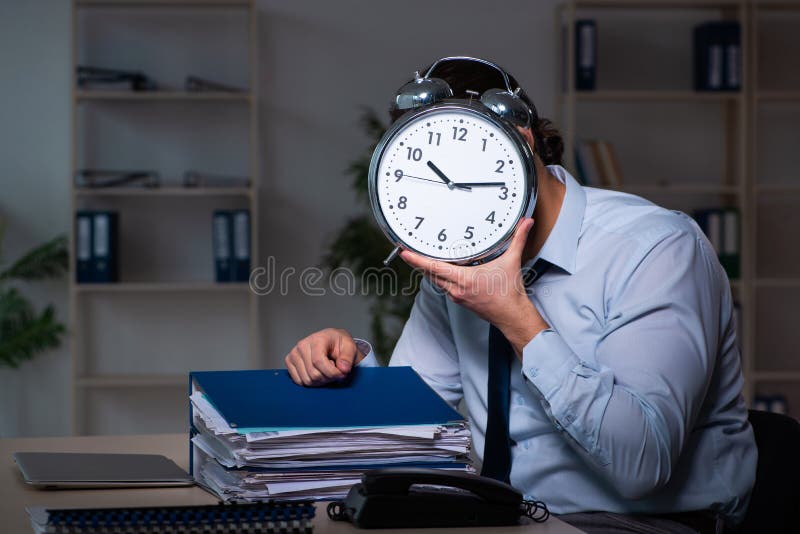 Young Businessman Working Late in the Office Stock Image - Image of ...