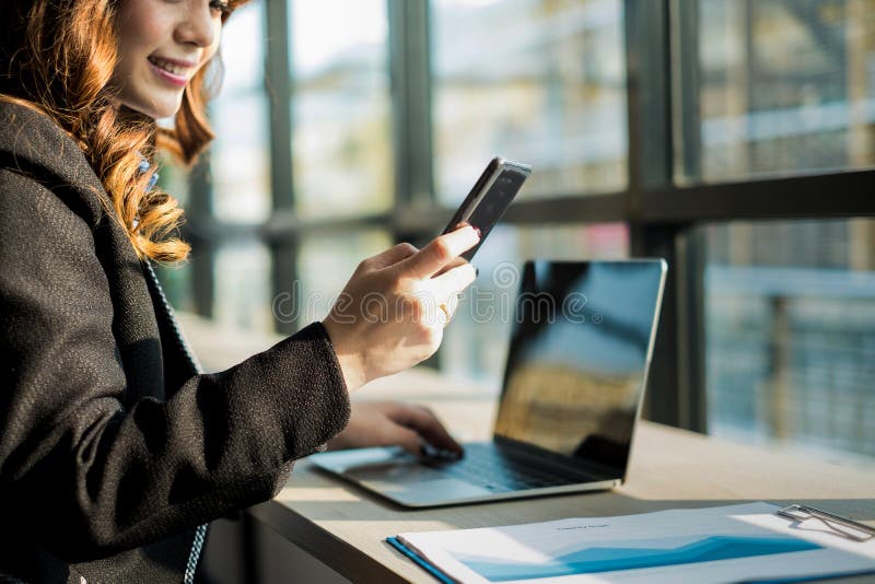 Young Businessman Working with Mobile Laptop and Documentsin Office ...