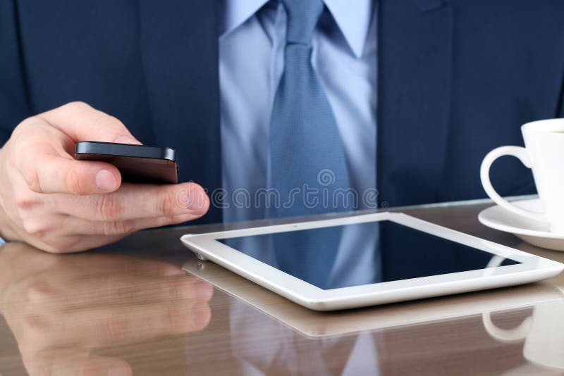 Young Businessman Working With Mobile Phone.Digital Tablet And Stock ...