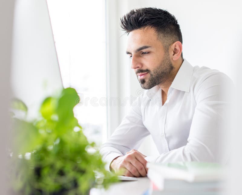 Young Businessman Working at Office on Computer Stock Photo - Image of ...