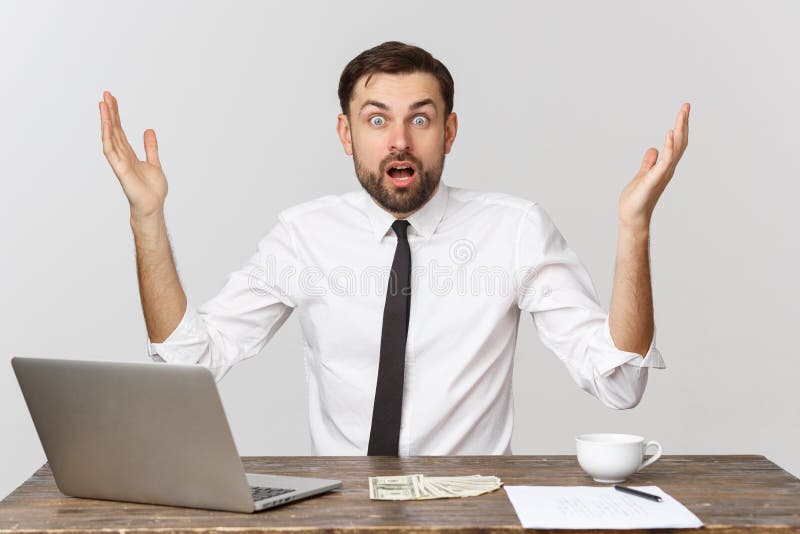 Young Businessman in a Workplace with Surprise and Shocked Facial ...