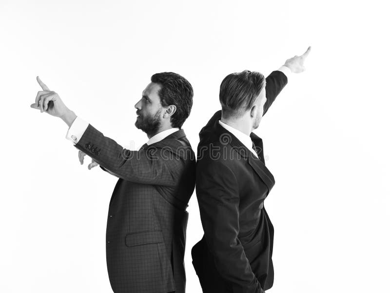 Pointing at Different Directions. Husband Stand with Dust Brush while ...