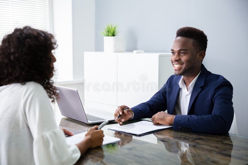 Young Businesspeople Sitting at Interview Stock Photo - Image of ...