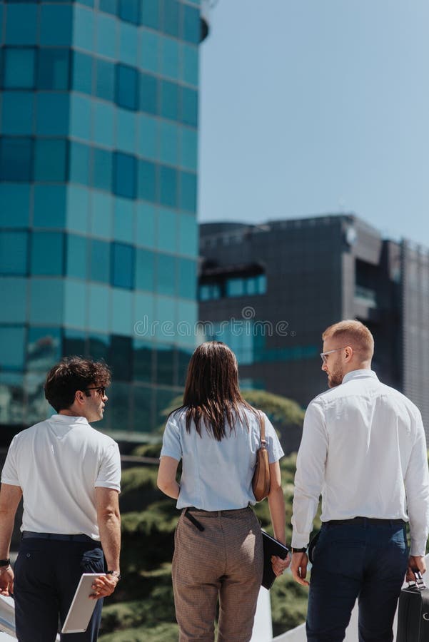 Young Businesspeople Walking Outside Stock Photo - Image of central ...