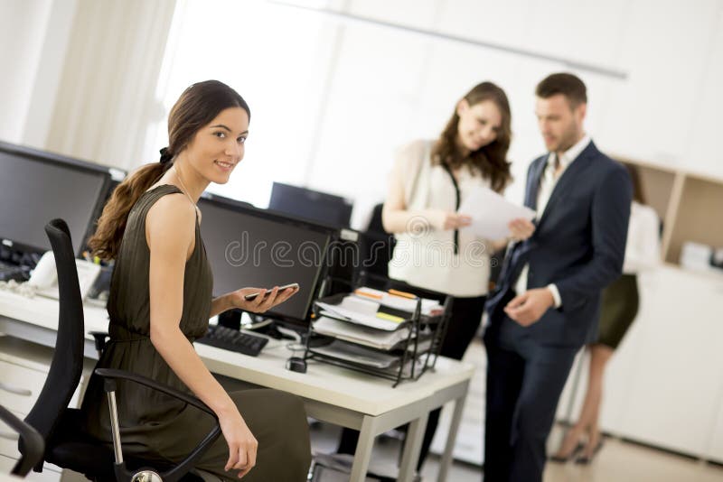Young Businesspeople Working in Modern Office Stock Image - Image of ...
