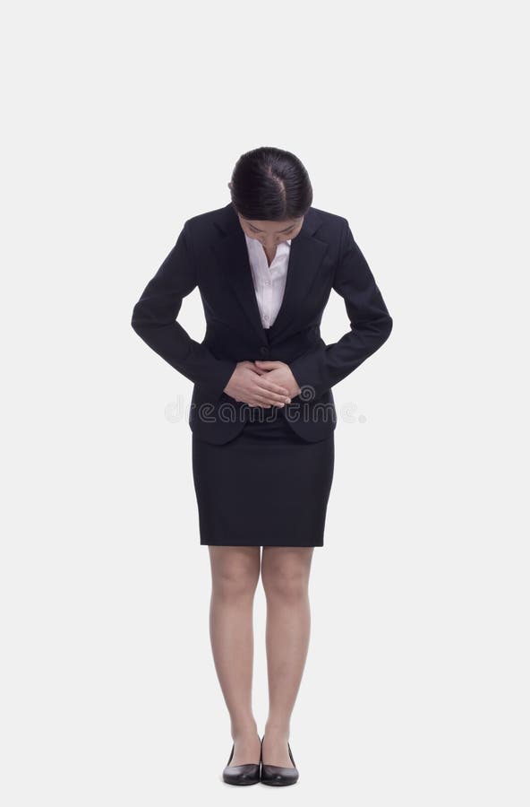 Young Businesswoman Bowing stock image. Image of shot - 31689435